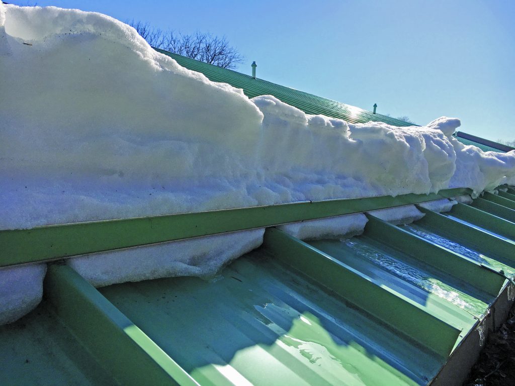 The Art & Science of Snow Mitigation on Metal Rooftops | Metal Roofing ...